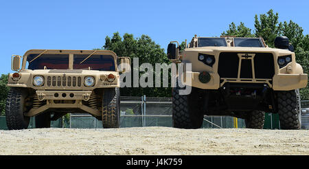A U.S. Army Humvee tactical vehicle fires a simulated tube-launched ...