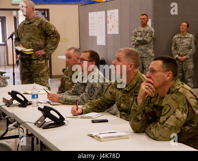 81st Troop Command staff personnel deliver a mission analysis briefing ...