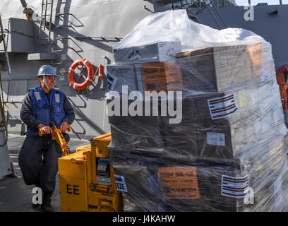USS Wayne E. Meyer (DDG 108) conducts a replenishment-at-sea with USNS ...
