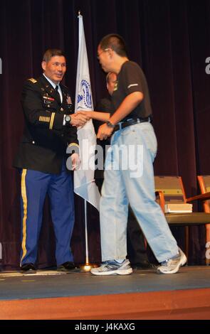 Lt. Col. David Clukey (at podium), commander, Phoenix Recruiting ...