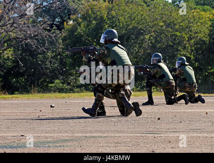 A soldier from the Malawi Defence Force stands in formation while ...