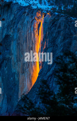 The Horsetail Falls view with water flowing through autumn forest Stock ...