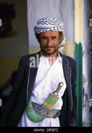 Yemen, Sana'a Yemeni man near Bab Al Sabah, in traditional dress, with ...