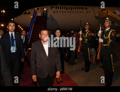 Philippine President Rodrigo Duterte, front center, poses for a family ...