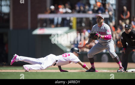 San Francisco Giants pinch-runner Jonah Cox scores in the eighth inning ...