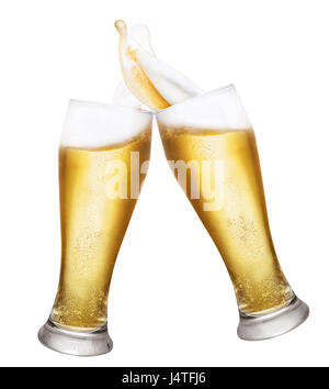 Foam splashes. Two glasses with lager foamy beer isolated over grey ...