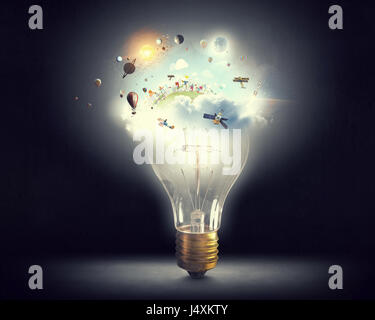 Think green concept with cityscape inside of light bulb Stock Photo - Alamy