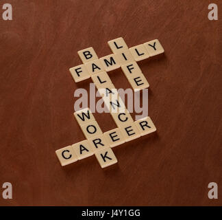 work life balance on the crossword board Stock Photo - Alamy
