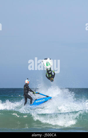 A jetski rider performing an aerial trick Jetski Jet ski Spectacular ...
