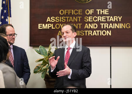 U.S. Secretary of Labor Alex Acosta signs the oath of office following ...
