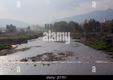 The Bagmati River that runs through the Kathmndu Valley and separates ...