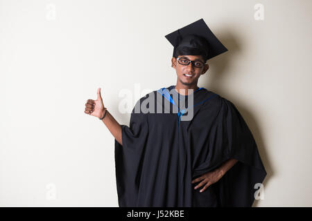 indian male graduate thumbs up Stock Photo - Alamy