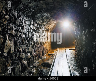 Mine with railroad track - underground mining Stock Photo - Alamy