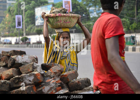 Bangladeshi day labourer works in a brick factory in Dhaka on 17 ...