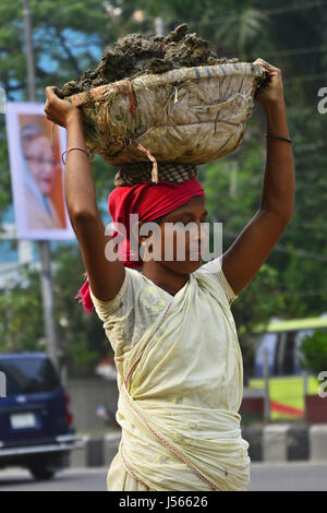 Bangladeshi day labourer works in a brick factory in Dhaka on 17 ...