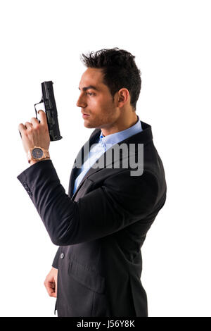 Secret service agent with a gun, isolated on white Stock Photo - Alamy