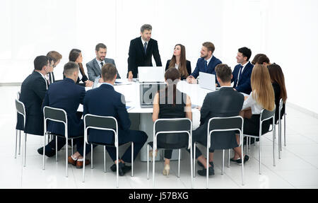Businesspeople Sitting At Conference Round Table At The Meeting Stock ...