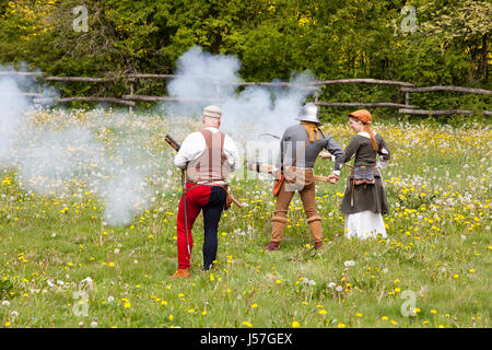 Hand cannons being fired by a reenactment group, reconstructed medieval ...