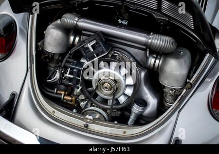 The engine compartment of a VW Beetle is open at the Maikaefertreffen ...