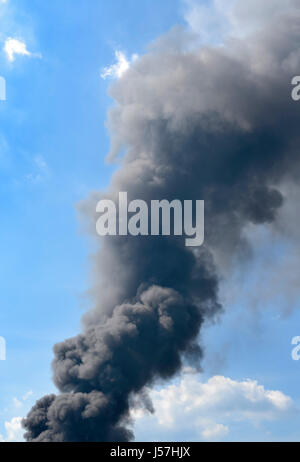 Huge smoke clouds on sky background Stock Photo - Alamy