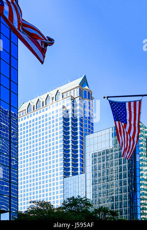 American Flags flying over the sidewalks in downtown Tampa City in ...