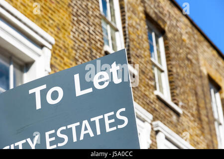 London, UK - April 8, 2017 - To Let sign outside a English townhouse ...