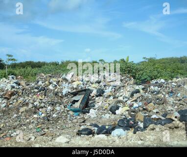Landfill dump with pile of trash and commercial construction debris ...