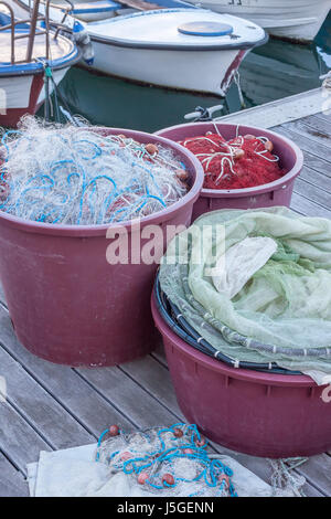 fishing nets and tackles in containers Stock Photo - Alamy
