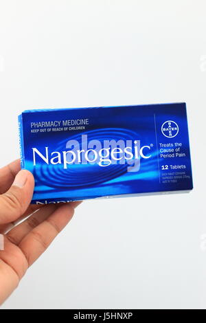 A box of Naprogesic tablets isolated against white background Stock ...