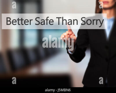 Better Safe Than Sorry Sign on white paper. Man Hand Holding Paper with ...
