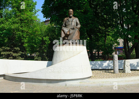 The statue of the poet Abai Qunanbaiuli in front of the Palace of the ...