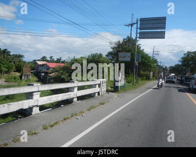 This section of MacArthur Highway runs through the towns of Malolos and ...