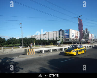 This title refers to the footbridge located on Marcos Highway in the ...