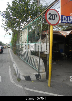 A photograph showcasing the MacArthur Highway in the Malolos-Guiguinto ...