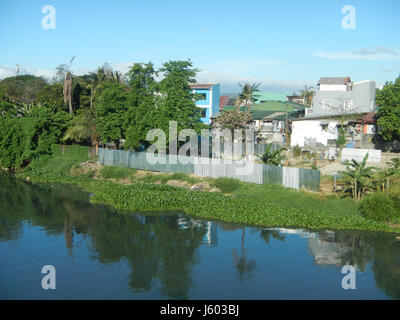 The Santa Rosa Bridge spans the Bagong Ilog River in Pasig City, Manila ...