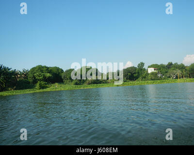 This image depicts the riverbanks and riprap constructions along the ...