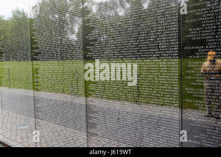 Names on the Vietnam Memorial Wall at Sunset. detail close up Stock ...