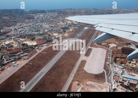 Malta airport runway and island aerial view taken inside departing ...