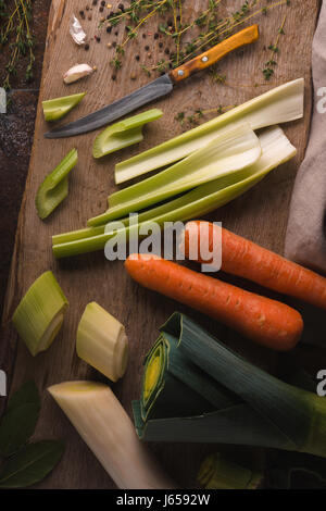Plate of cut fresh celery on light background Stock Photo - Alamy