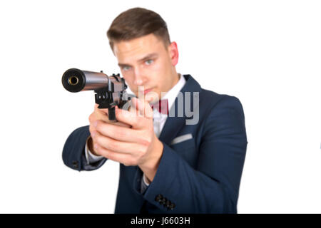 Confident businessman pointing a gun on isolated background Stock Photo ...