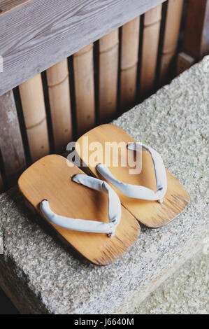 Traditional Japanese wooden flip flops Stock Photo - Alamy