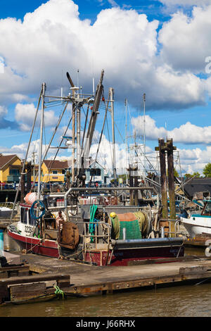 Commercial fishing vessel tethered to a dock in Steveston, British ...