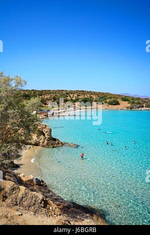 People swimming and relaxing on Istro, beach one of Crete's northern ...