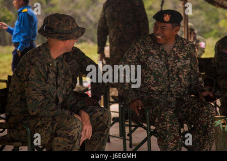 U.S. Marine Corps Maj. Ben Reid, left, executive officer of 2nd ...