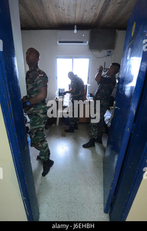 Members of the Lebanese Armed Forces conduct checks in a section of the ...