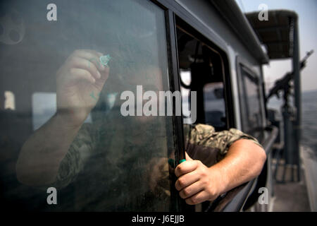 Engineman 3rd Class Brian Graves , assigned to Coastal Riverine ...