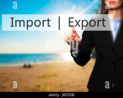 Import - Hand pressing a button on blurred background concept ...