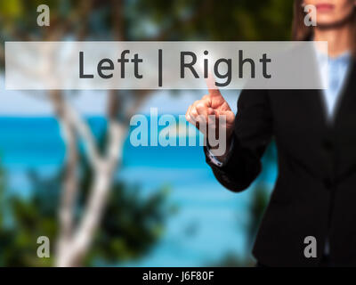 Left Right - Businesswoman hand pressing button on touch screen ...