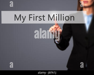 My First Million - Businesswoman hand pressing button on touch screen ...