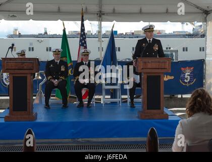 Cmdr. Carl Trask, from Glendora, California, is rung ashore for the ...